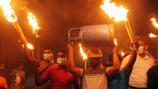 Torch light protest by SJB - Caption Story | Daily Mirror
