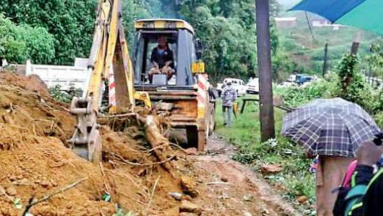 Heavy rains, earth slips and flood threats continue - Front Page ...