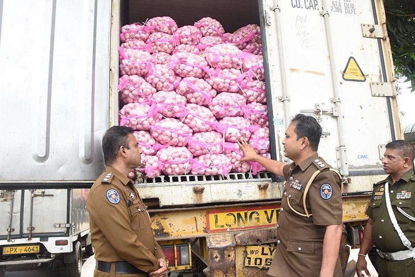 Five arrested for pilferage of garlic from container in Ragama ...