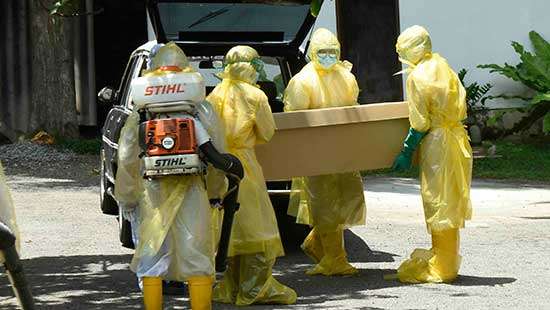 Cardboard coffins to cremate COVID victims - Caption Story | Daily Mirror