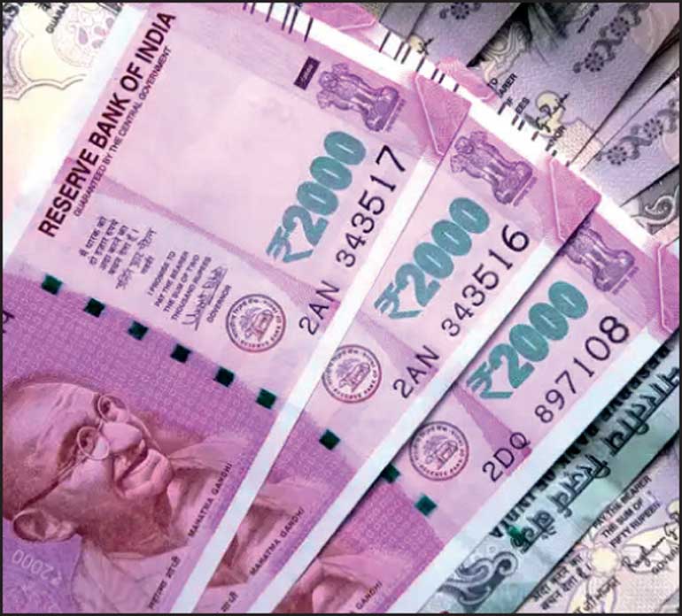 Indian rupee slips to all-time low of 91.07 against US dollar | Daily FT