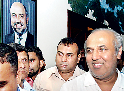 SLMC Leader Rauff Hakeem arriving for a press conference yesterday ...