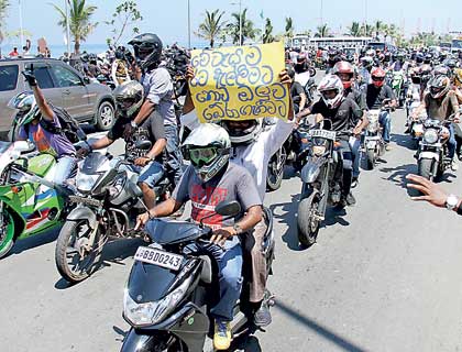 Full face helmet ban under fire | Daily FT